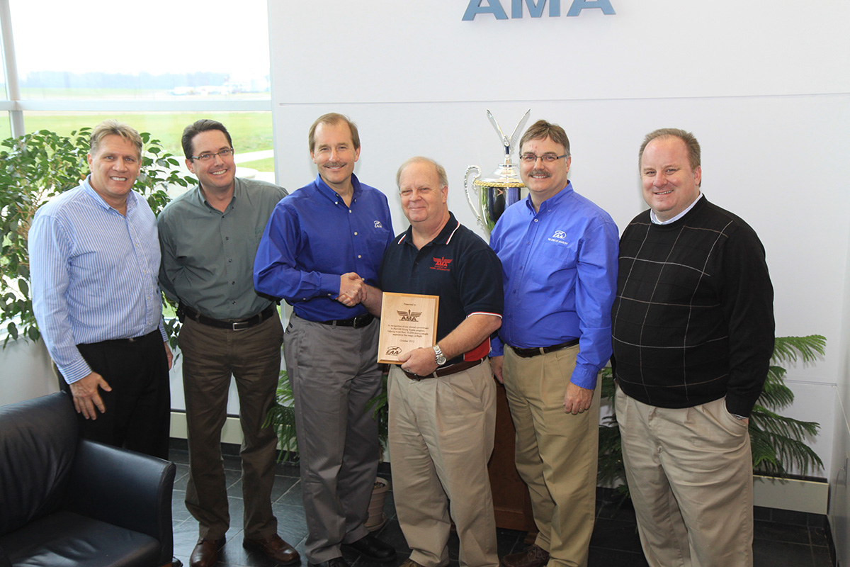 EAA representatives present 10,000 youth member plaque to AMA ...